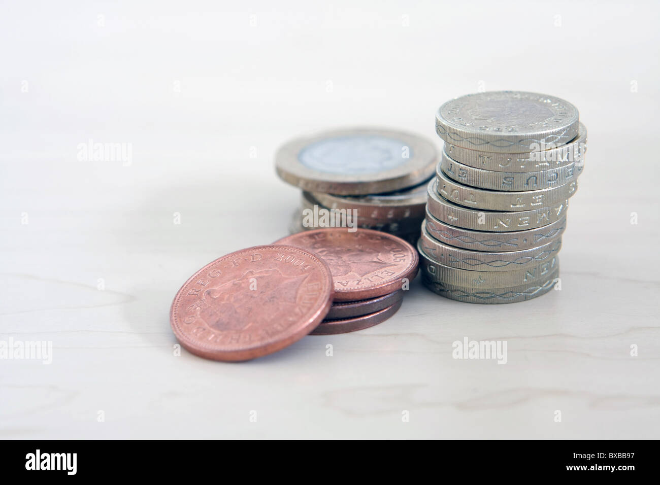 stacks of £2, £1 and 2p sterling coins Stock Photo - Alamy