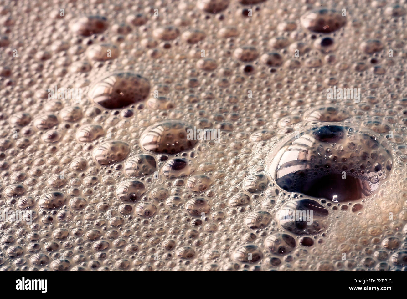 Closeup on some big and small foam bubbles Stock Photo - Alamy