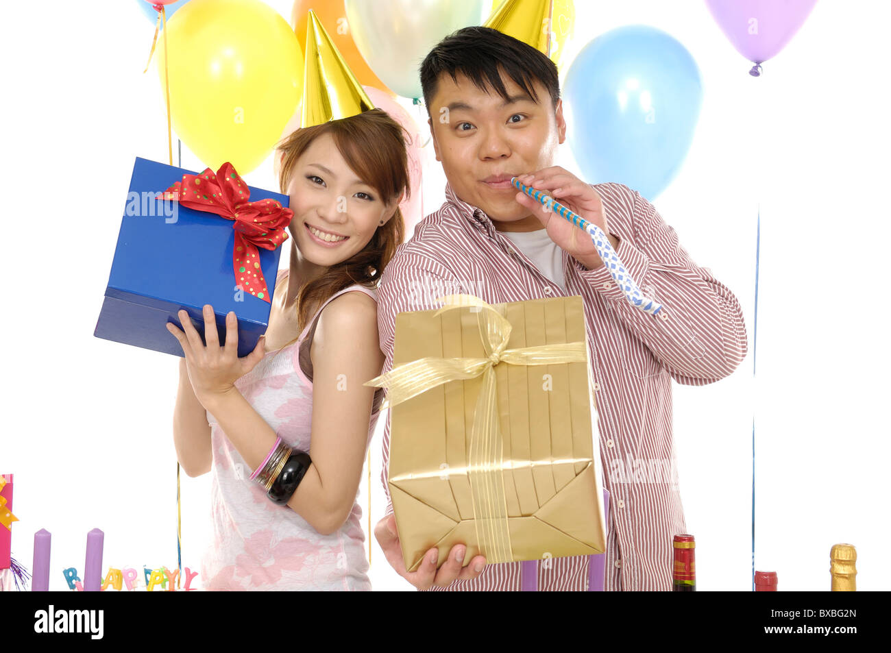 Friends celebrating a birthday party Stock Photo - Alamy