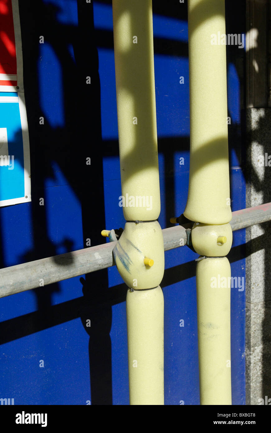 Sponge safety protection wrapped around scaffolding Stock Photo - Alamy