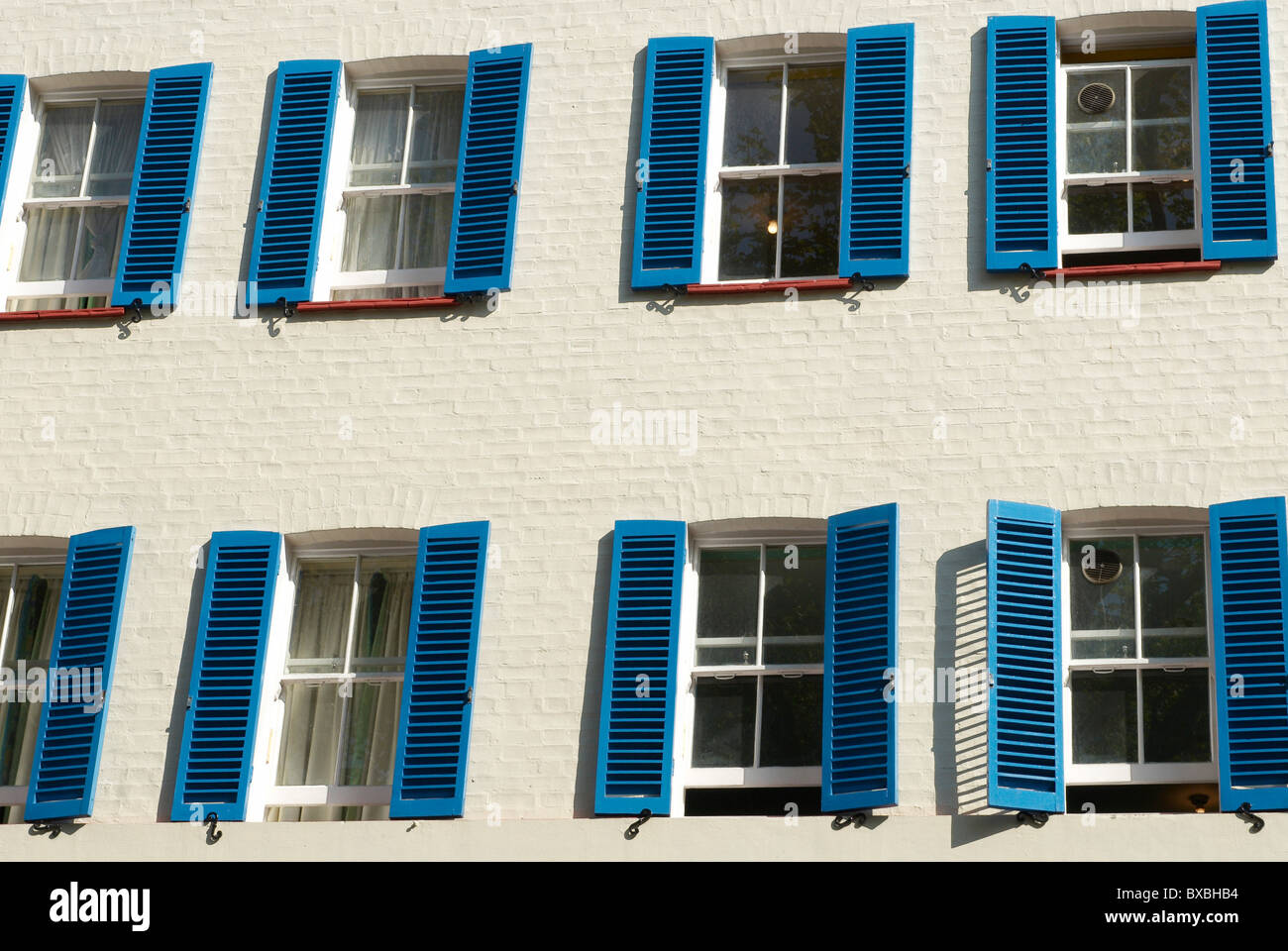 Mediterranean style blue shuttered windows Clerkenwell London UK Stock ...