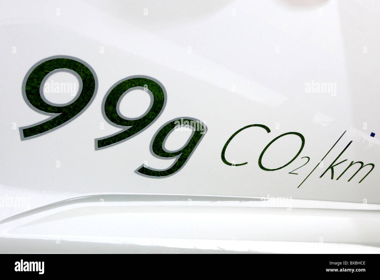 Lettering 99 grams of CO2 emissions on a vehicle at the 63 ...