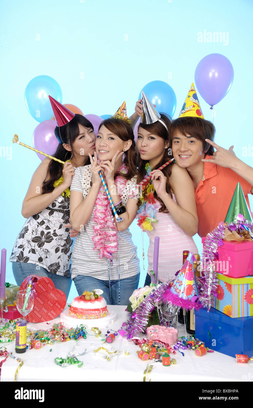Friends celebrating a birthday party Stock Photo - Alamy