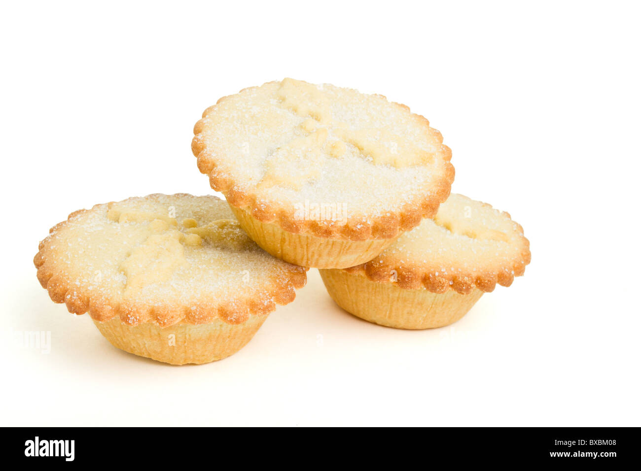 Stack of sweet mince pies from low perspective isolated on white Stock ...