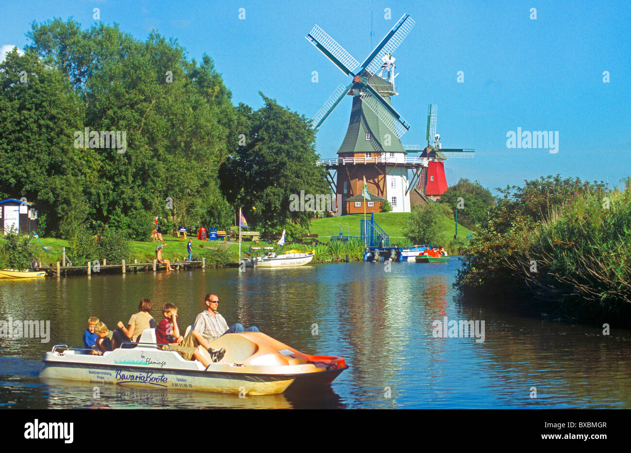 twin windmills at Greetsiel in East Friesland in Northern Germany Stock ...