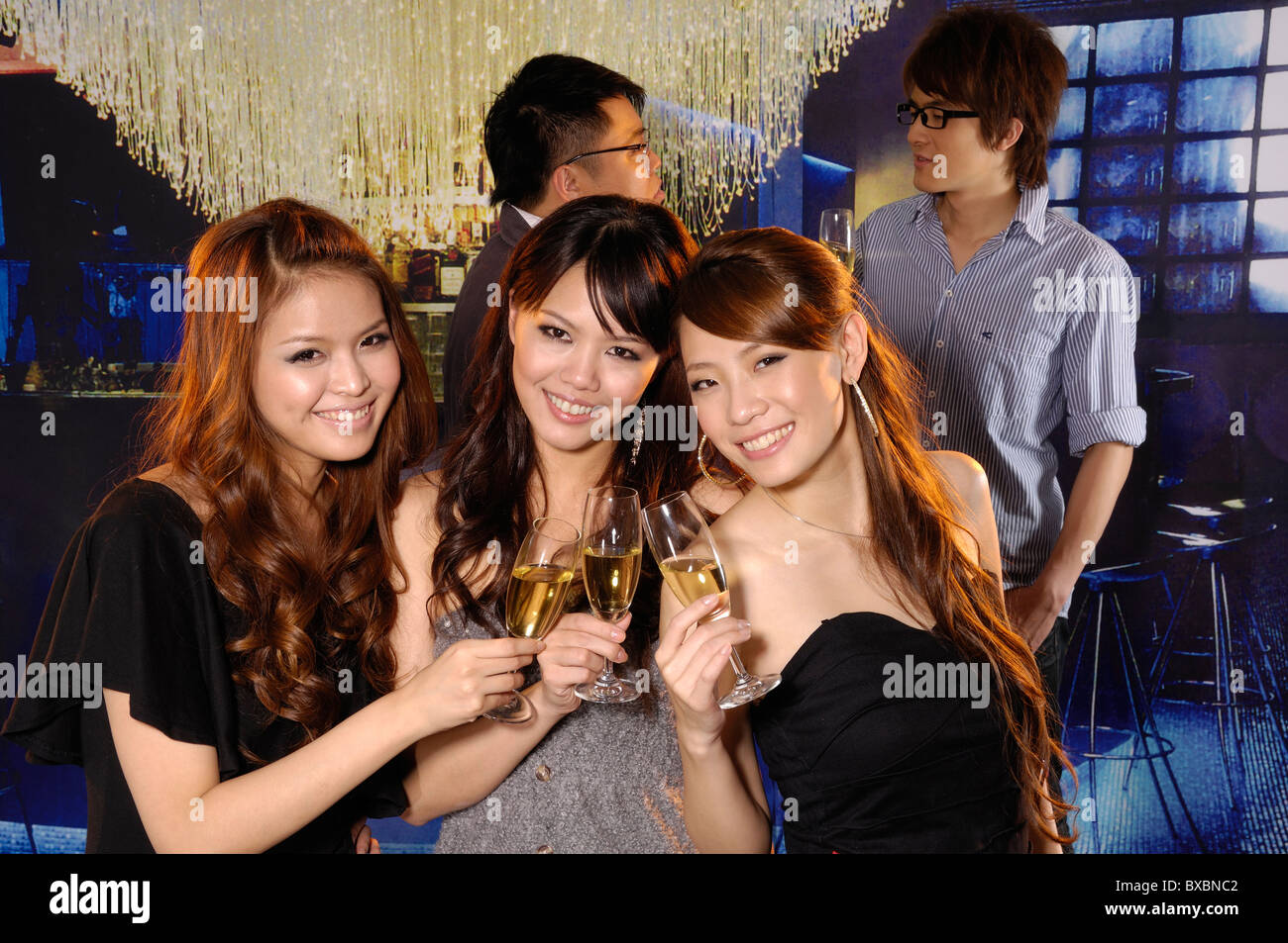 Friends celebrating a party in a bar, Taipei, Taiwan Stock Photo - Alamy