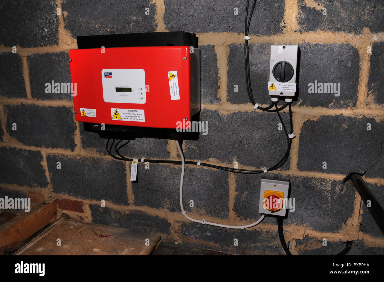 Solar panel installation showing the roof panels, inverter and internal ...