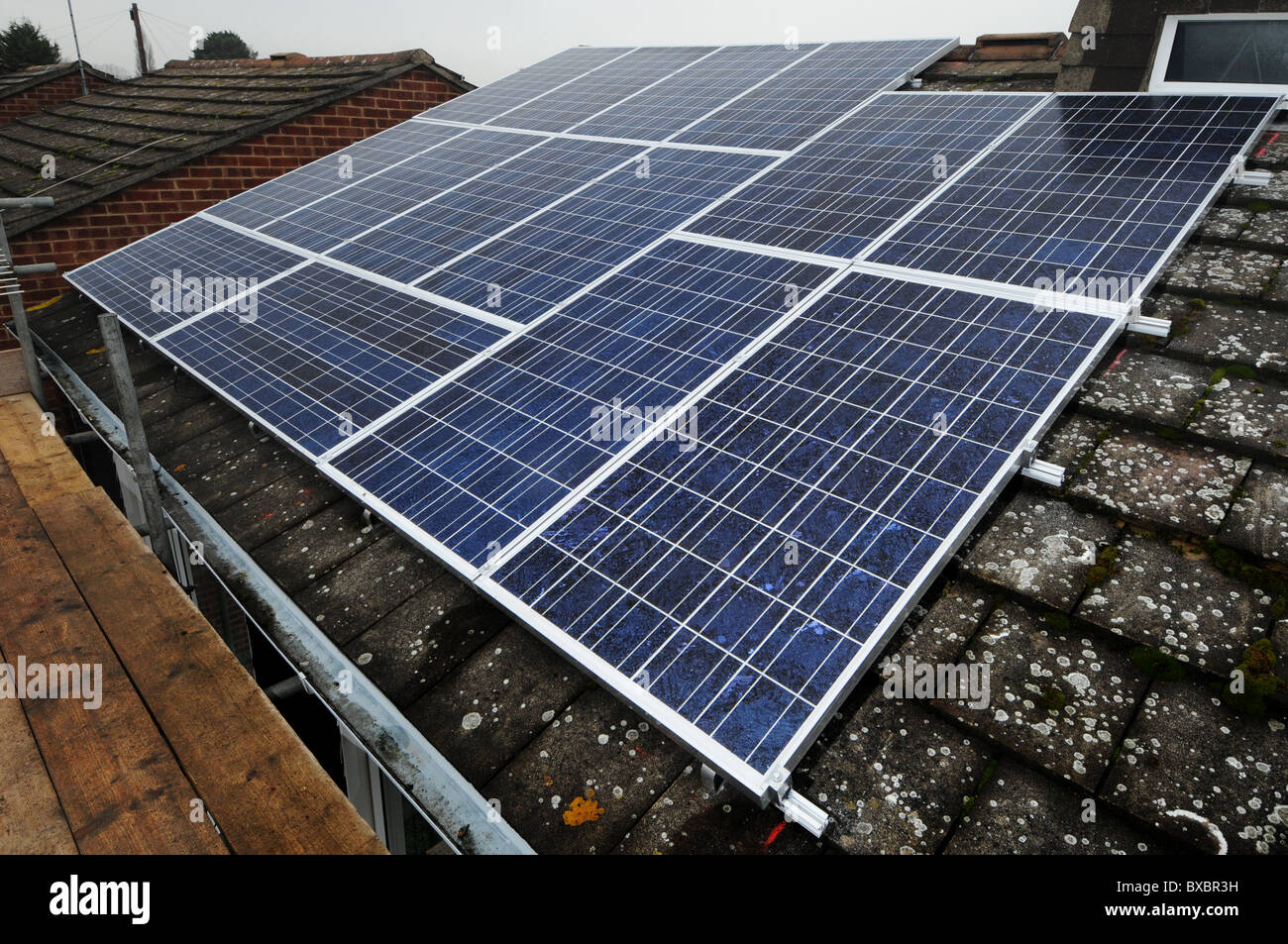 Solar panel installation showing the roof panels, inverter and internal ...