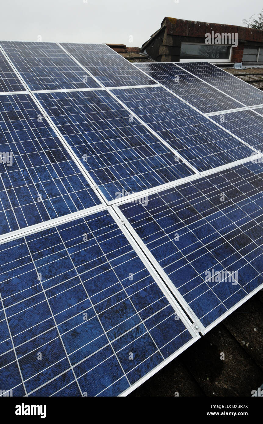 Solar panel installation showing the roof panels, inverter and internal ...