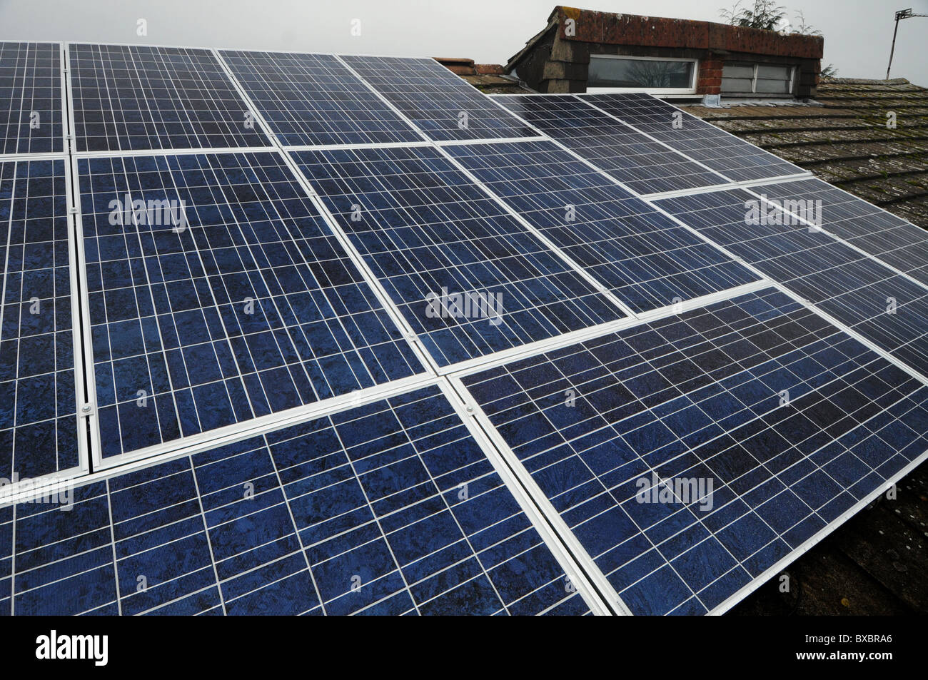 Solar panel installation showing the roof panels, inverter and internal ...
