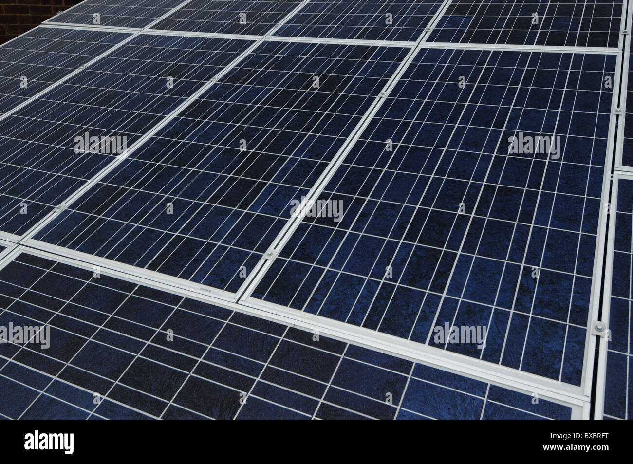 Solar panel installation showing the roof panels, inverter and internal ...