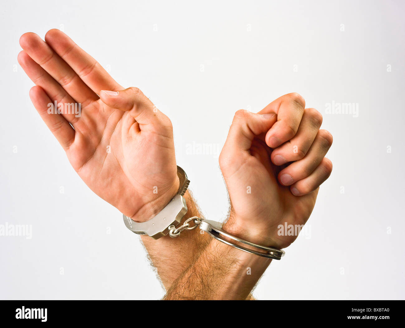 Shackled wrists hi-res stock photography and images - Alamy