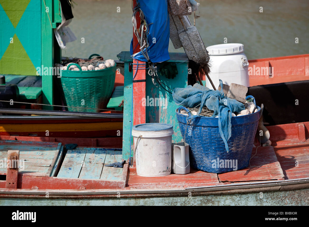 Close up of the fishing nets in plastic buckets on shrimp fishing boats ...