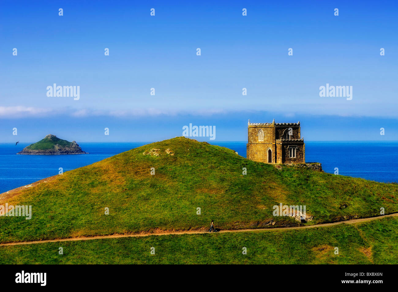 Photo shows Doyden Castle, a folly that has been turned into a coastal ...