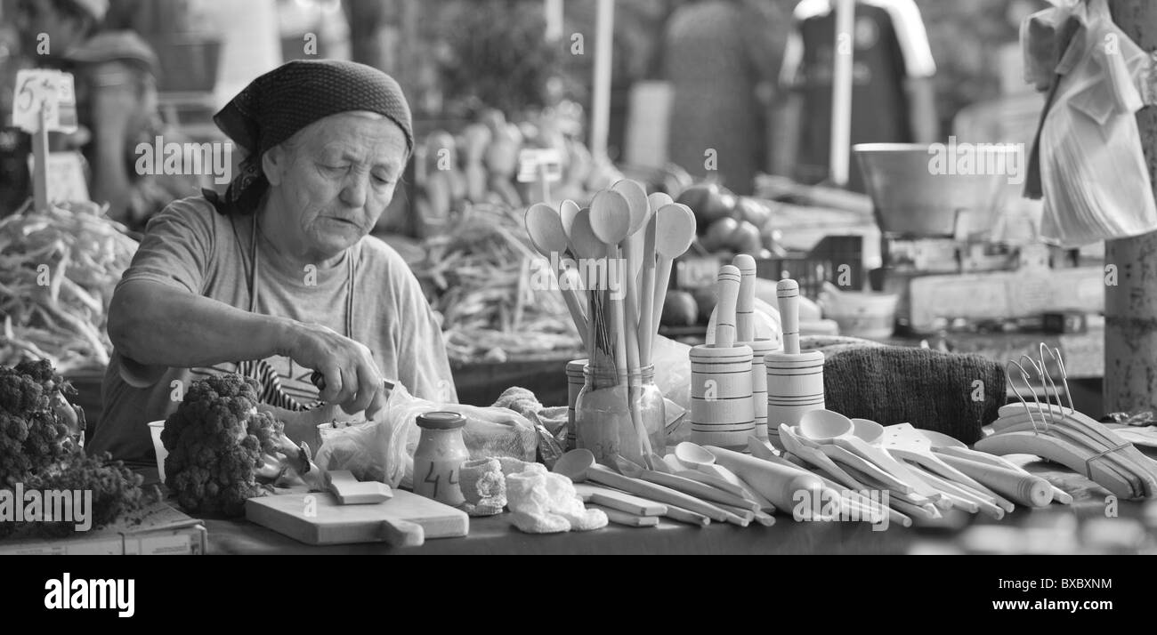 Old woman selling handmade products at the 700 market in Timisoara on ...