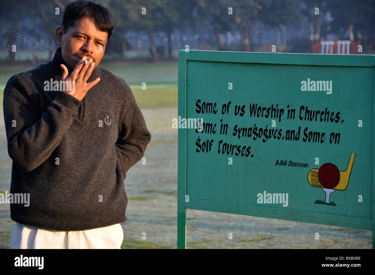 A golfer smoking Stock Photo - Alamy