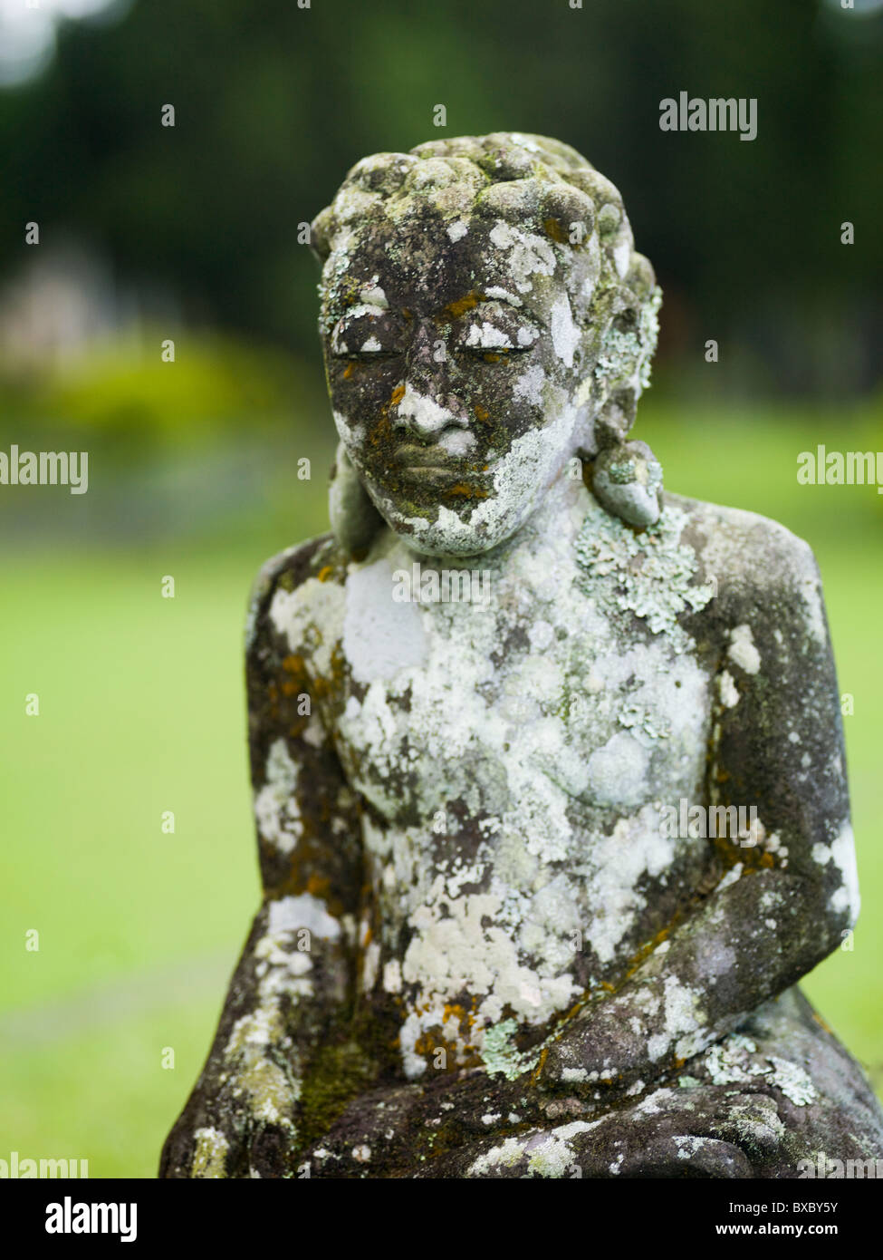 Weathered statue in Bali Stock Photo - Alamy