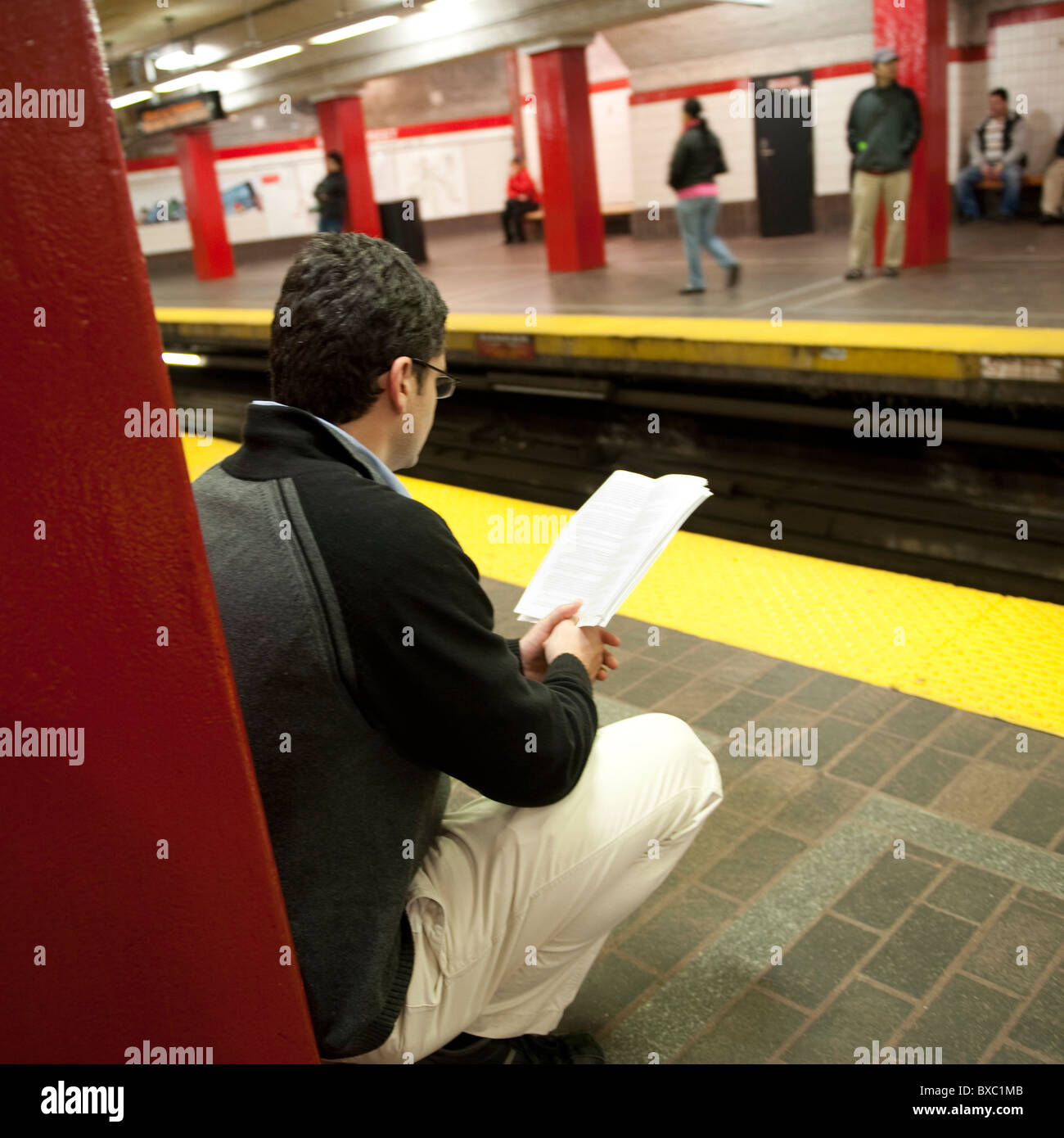 Man reading in the subway in boston hi-res stock photography and images ...