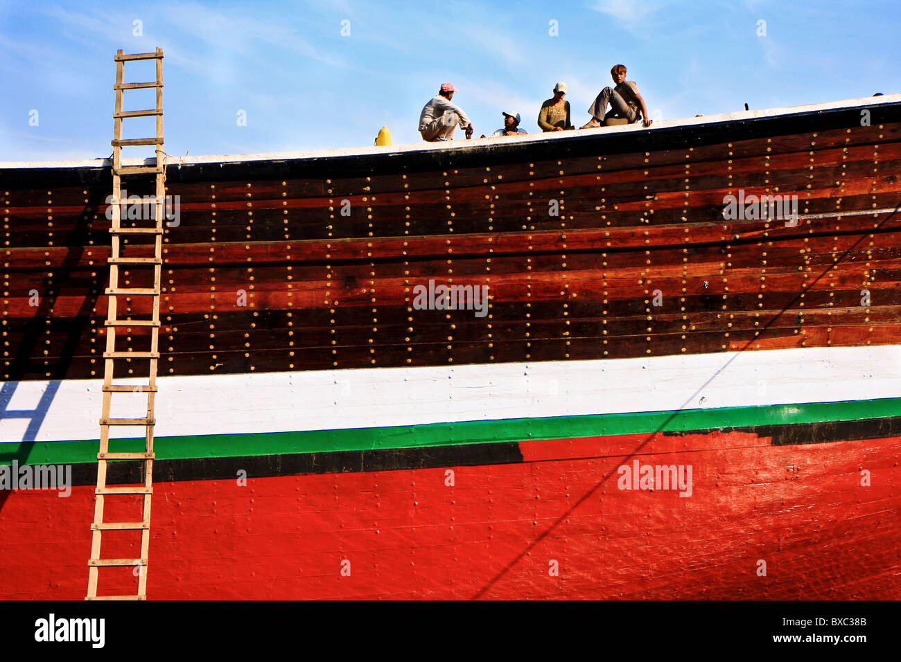 Indian men working on a ship Stock Photo - Alamy