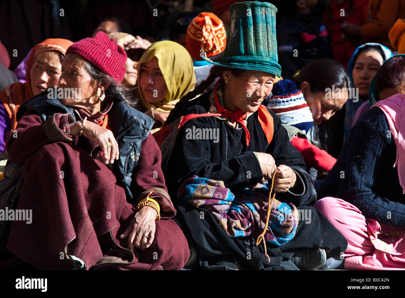 Ladakhi women in the crowd wearing colorful hats and head dress Stock ...