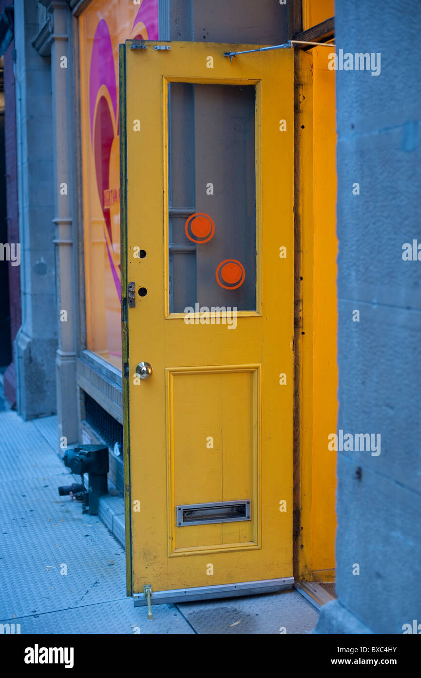 Yellow door in Manhattan, New York City, U.S.A Stock Photo - Alamy