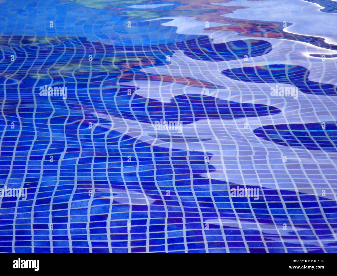 swimming pools tiles with water and reflections Stock Photo - Alamy