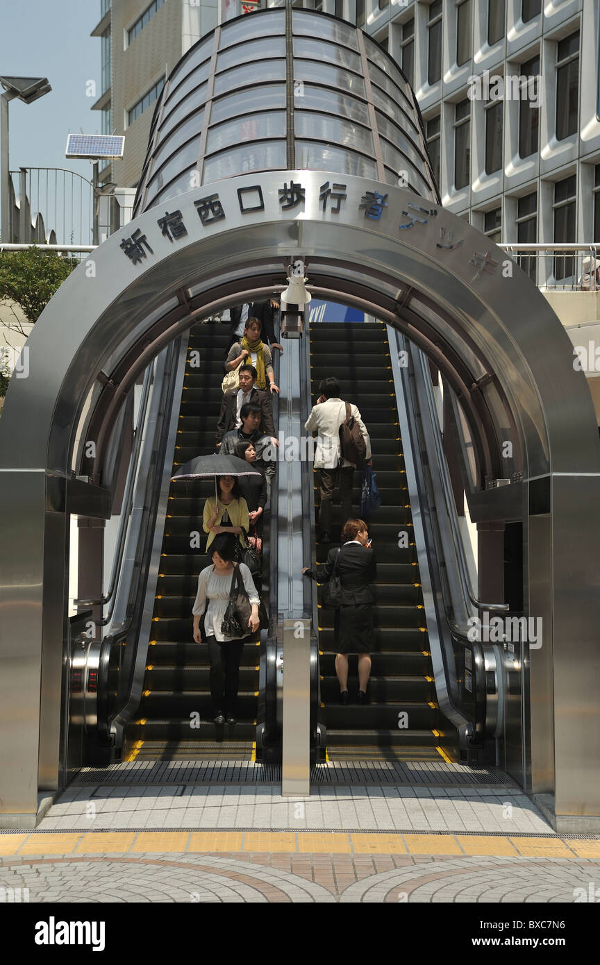 Glazed escalators in Shinjuku, Tokyo, Japan Stock Photo - Alamy