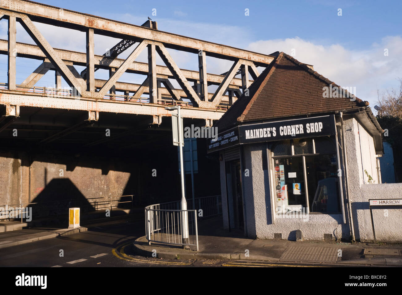Corner shop under railway bridge at Maindee Newport South Wales UK ...