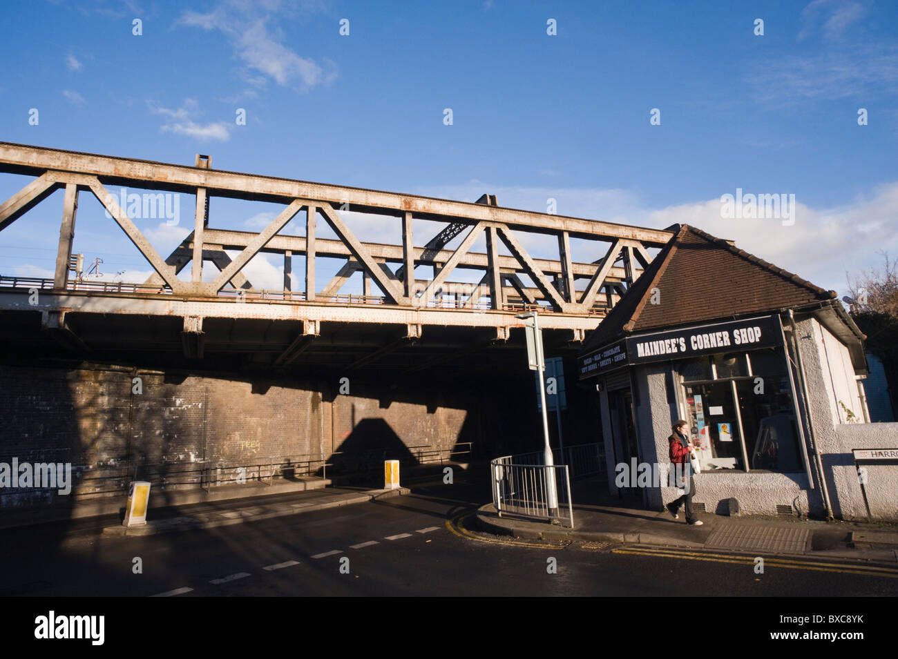 Corner shop under railway bridge at Maindee Newport South Wales UK ...