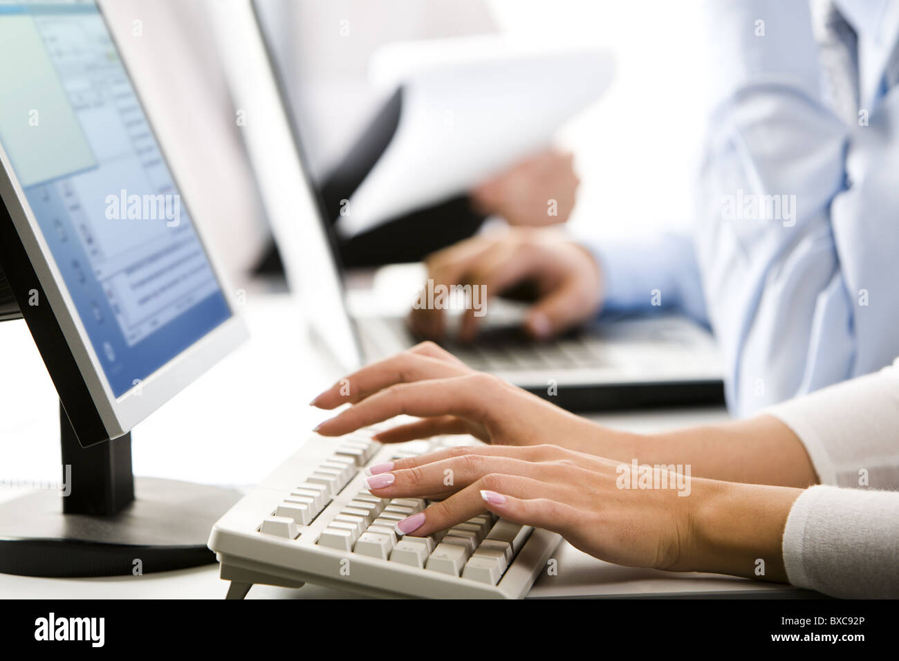 Female hands typing a letter on the keyboard Stock Photo - Alamy