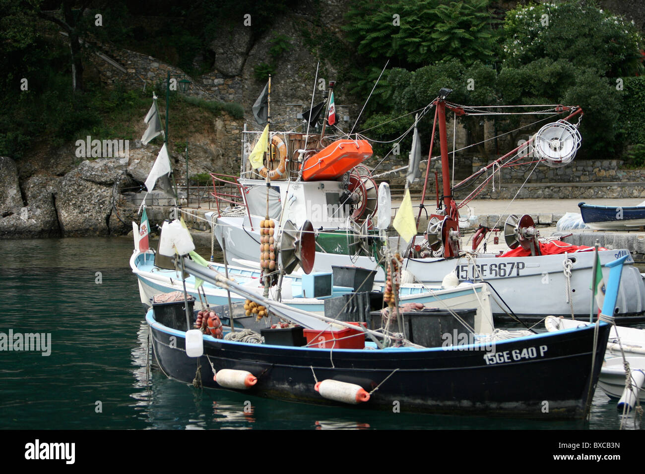 A small fishing boat in the harbour town of Portofino, Italy Stock ...