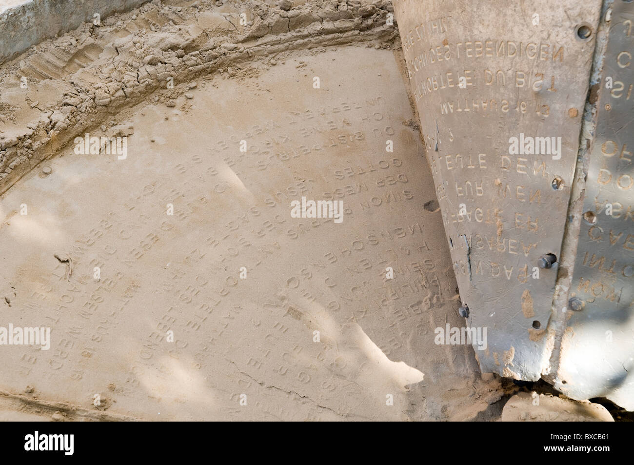 Sand Verses. Versus from the scripture embossed in sand Stock Photo - Alamy
