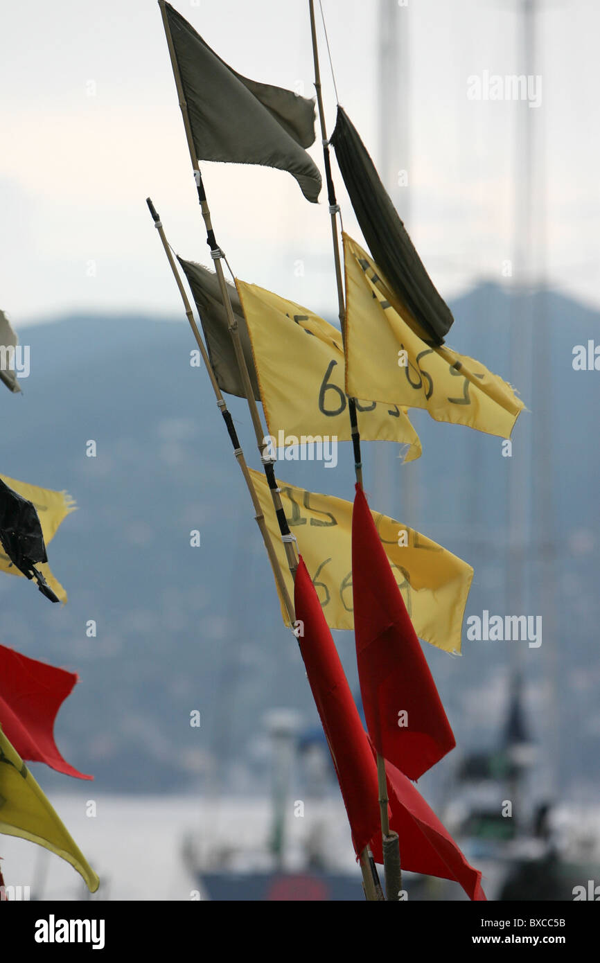 Coloured flags on a fishing boat in the Italian town of Portofino Stock ...