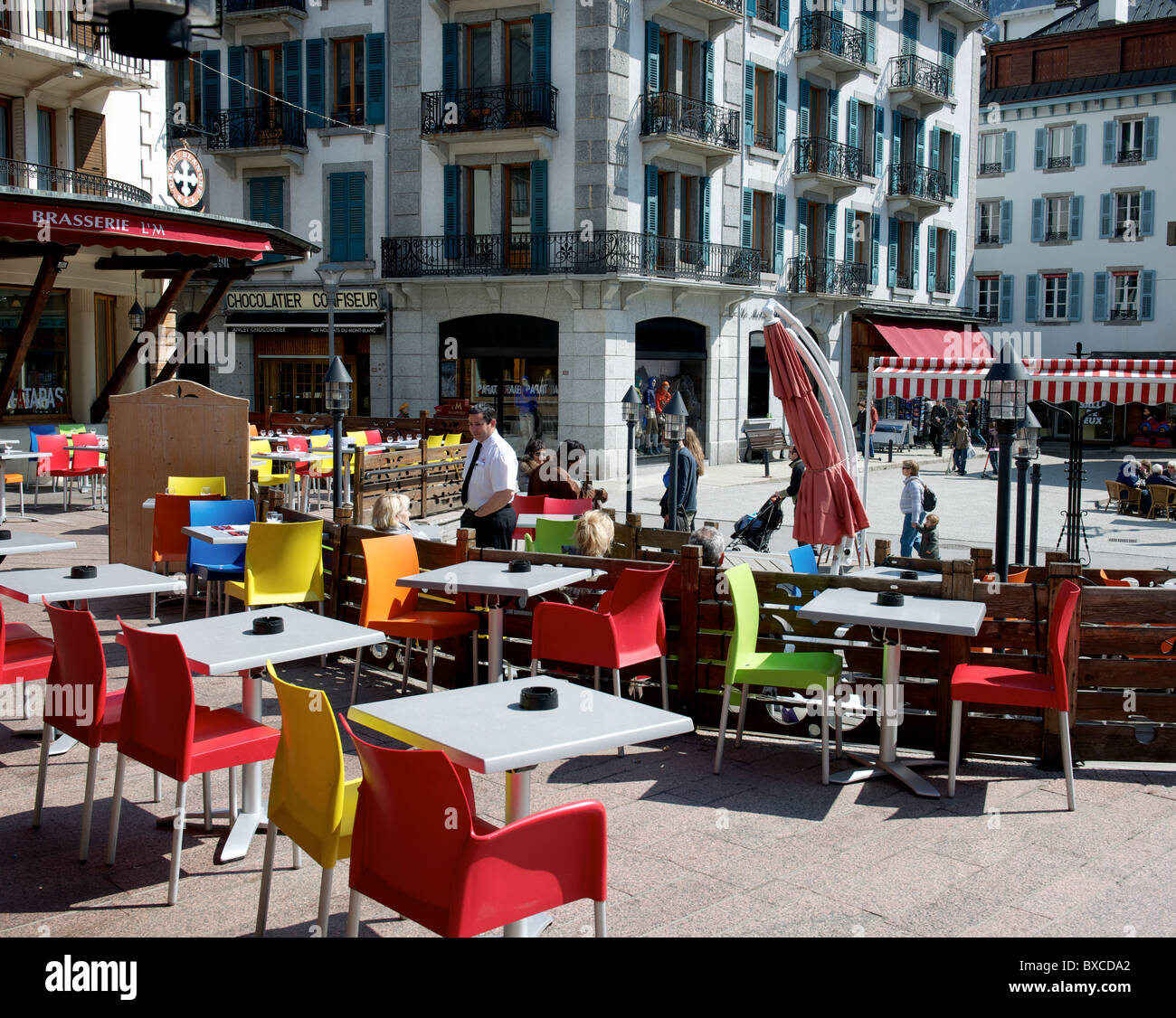 Coloured seating in cafe, Chamonix Town Centre, France Stock Photo - Alamy