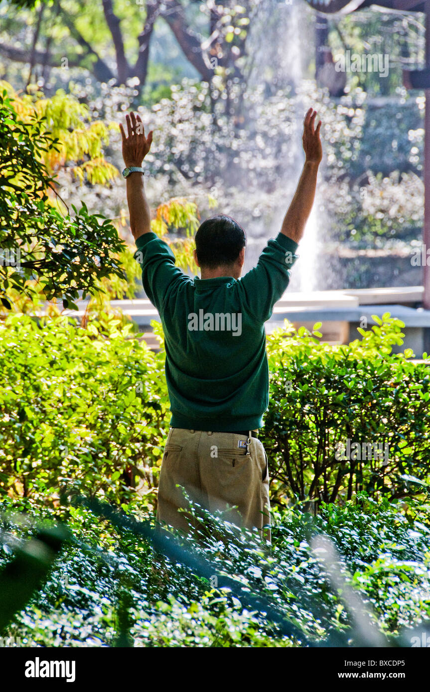 Man practicing Tai Chi in park in Hong Kong China Stock Photo - Alamy