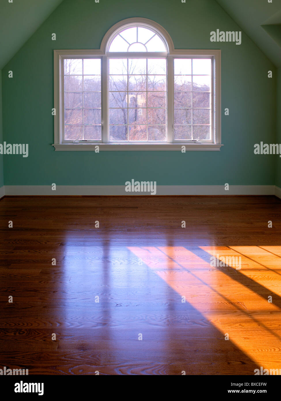 Window With Shaft Of Light In Empty Room Stock Photo - Alamy