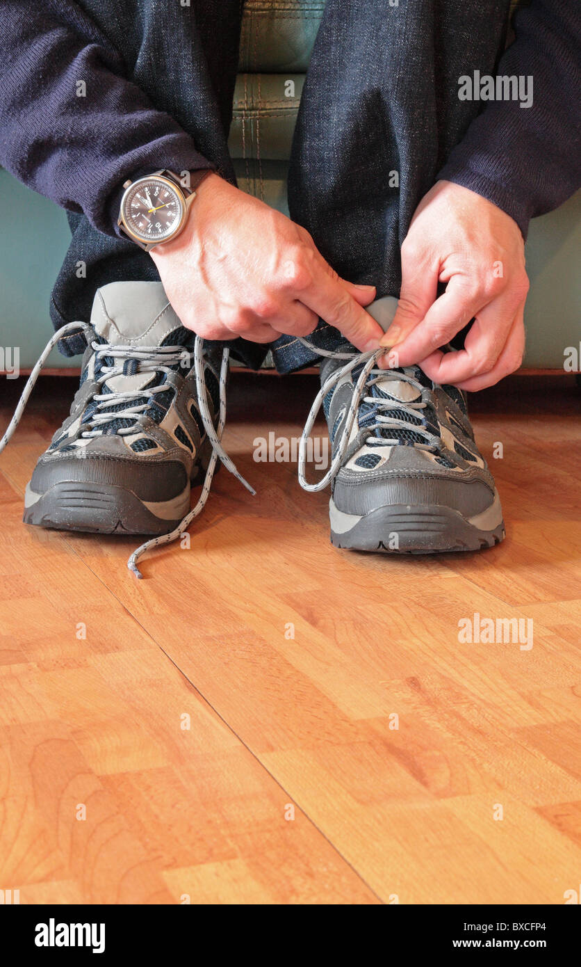 Tieing sneakers hi-res stock photography and images - Alamy