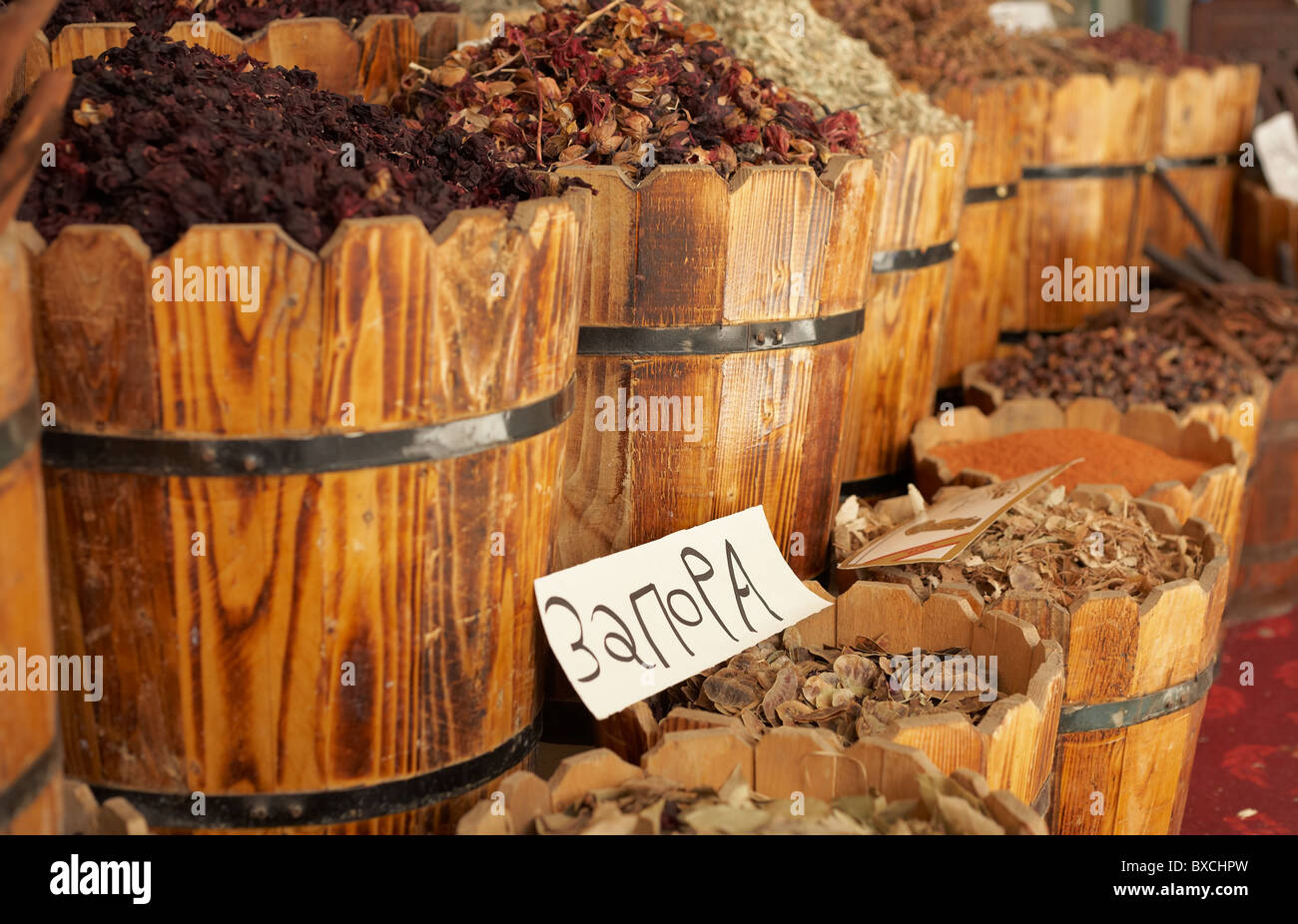 Natural food items and medical herbs in tub containers Stock Photo - Alamy