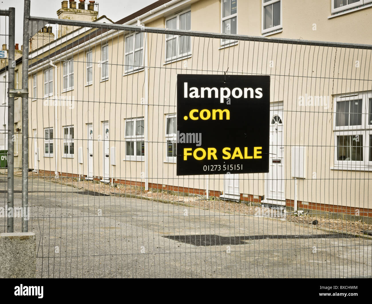 For Sale Sign on empty new property development Stock Photo - Alamy