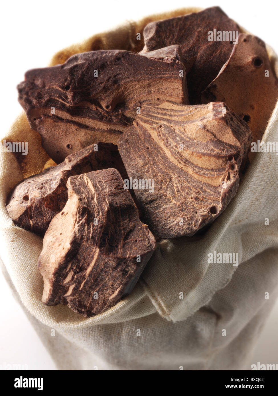 Raw Cacao liquor pieces Stock Photo - Alamy