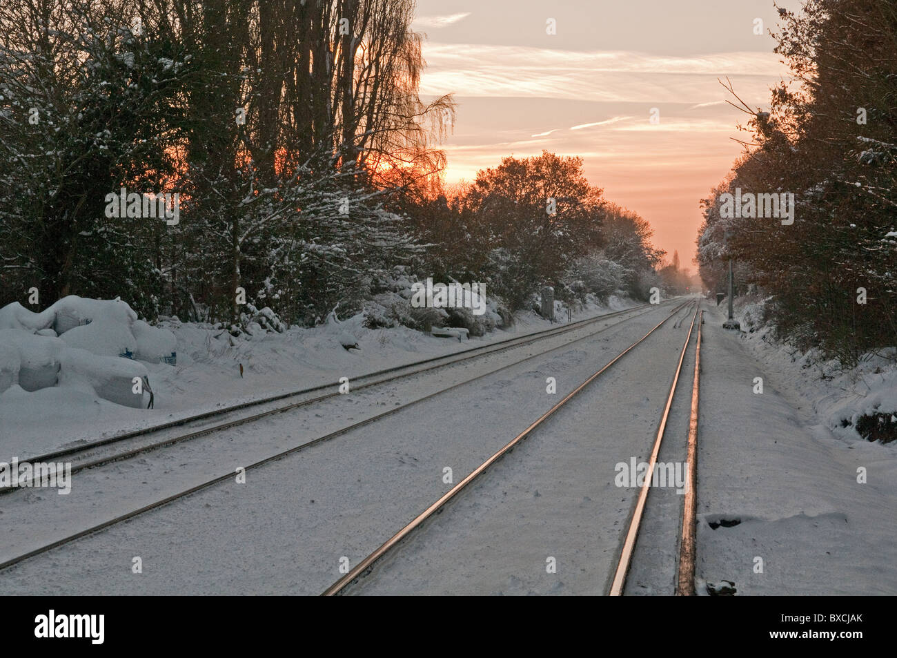 Railway line in snow. Surrey, UK. 2010 Stock Photo - Alamy