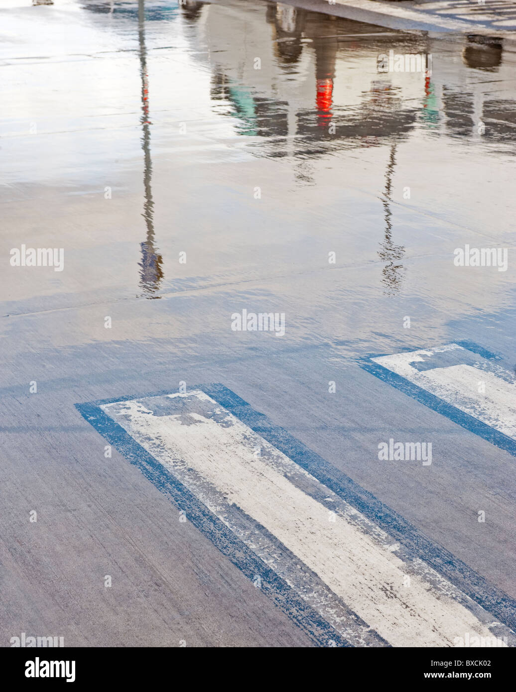 Abstract view of the wet surface of a parking lot Stock Photo - Alamy