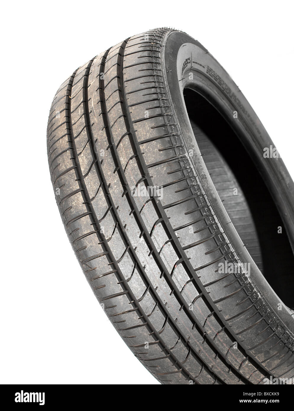 Detail of a car tire isolated on white Stock Photo - Alamy