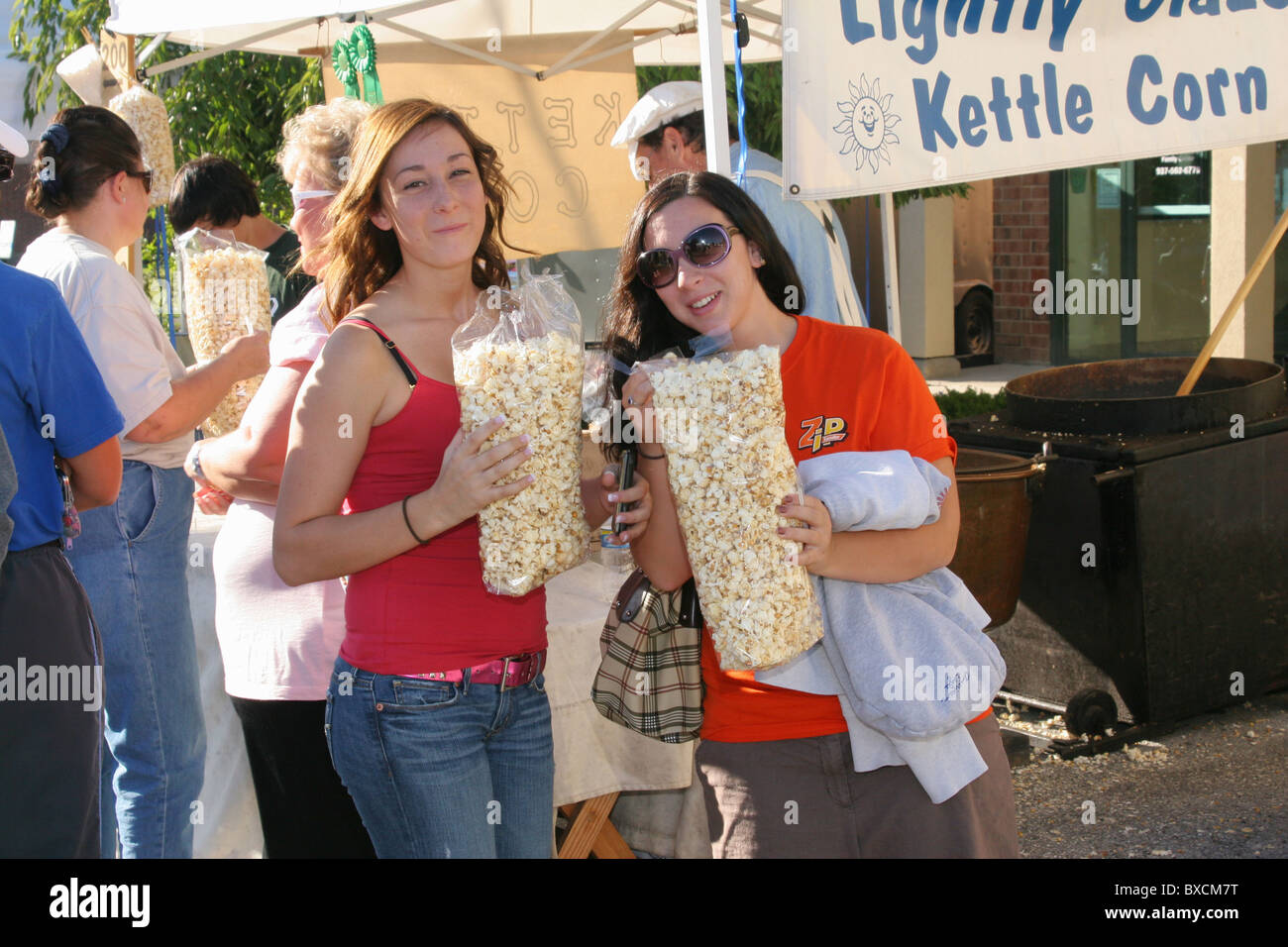 Women with bags of Kettle Corn Popcorn. Beavercreek Popcorn Festival ...