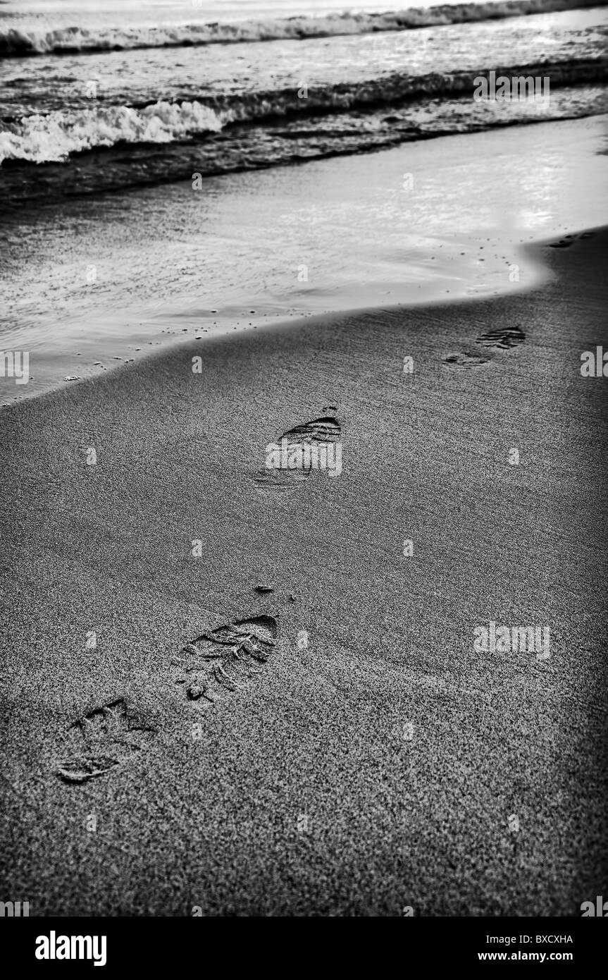 Sandy beach footprints in Black and White Stock Photos & Images - Alamy