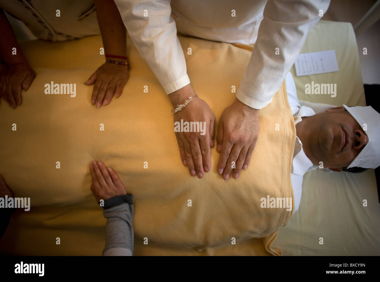 A man receives Reiki in Mexico City Stock Photo - Alamy