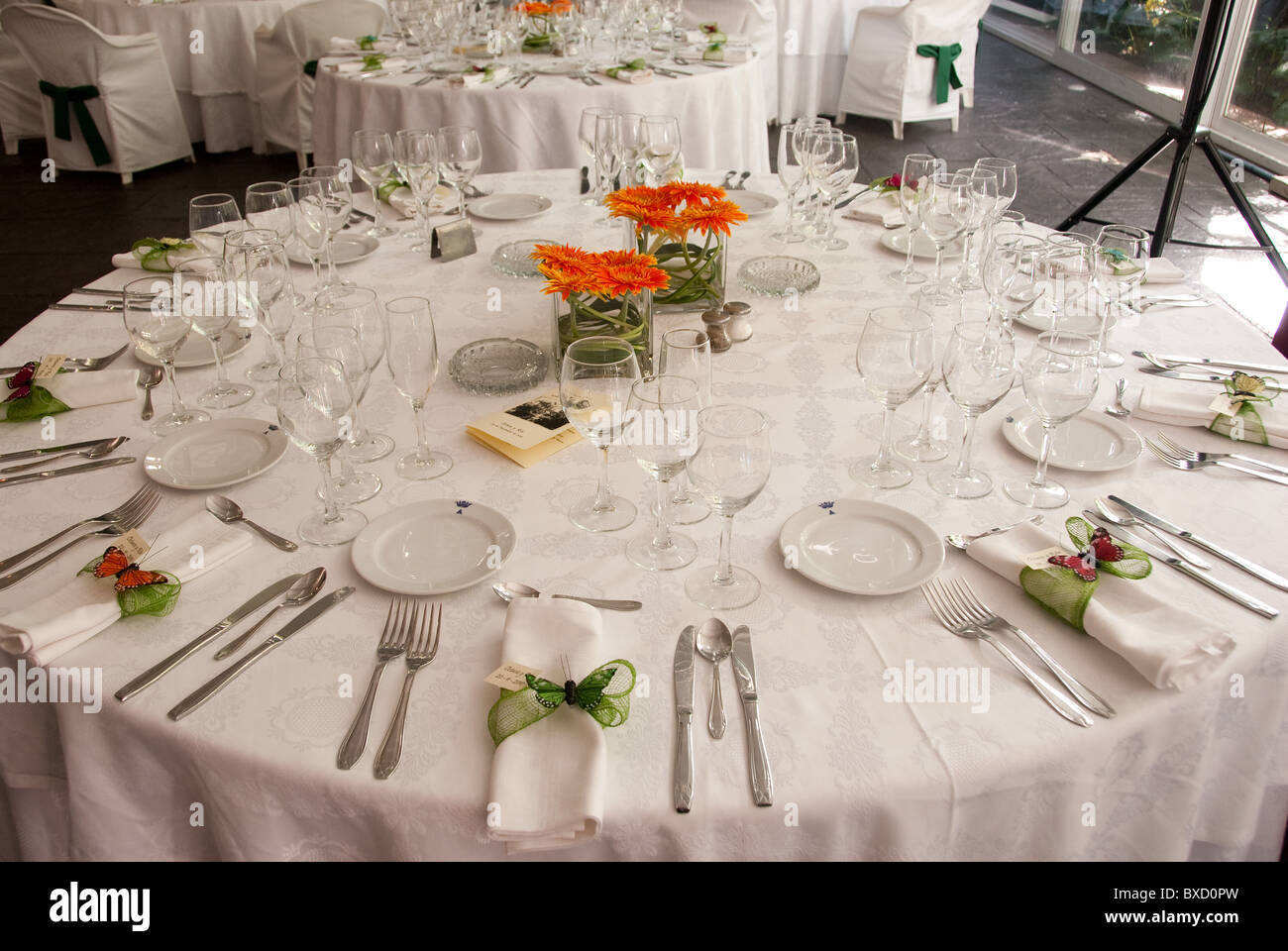Dining table set out at wedding reception Stock Photo - Alamy