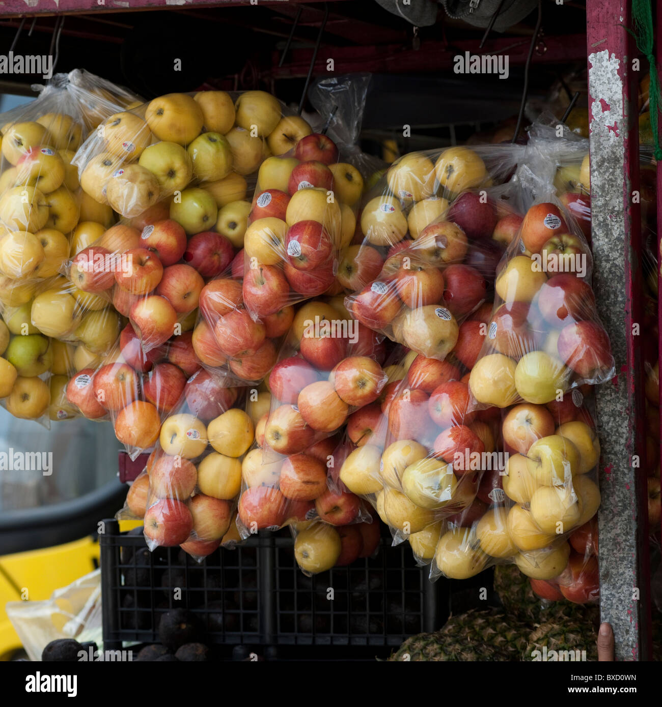 Display of bags of apples in San Jose Costa Rica Stock Photo - Alamy
