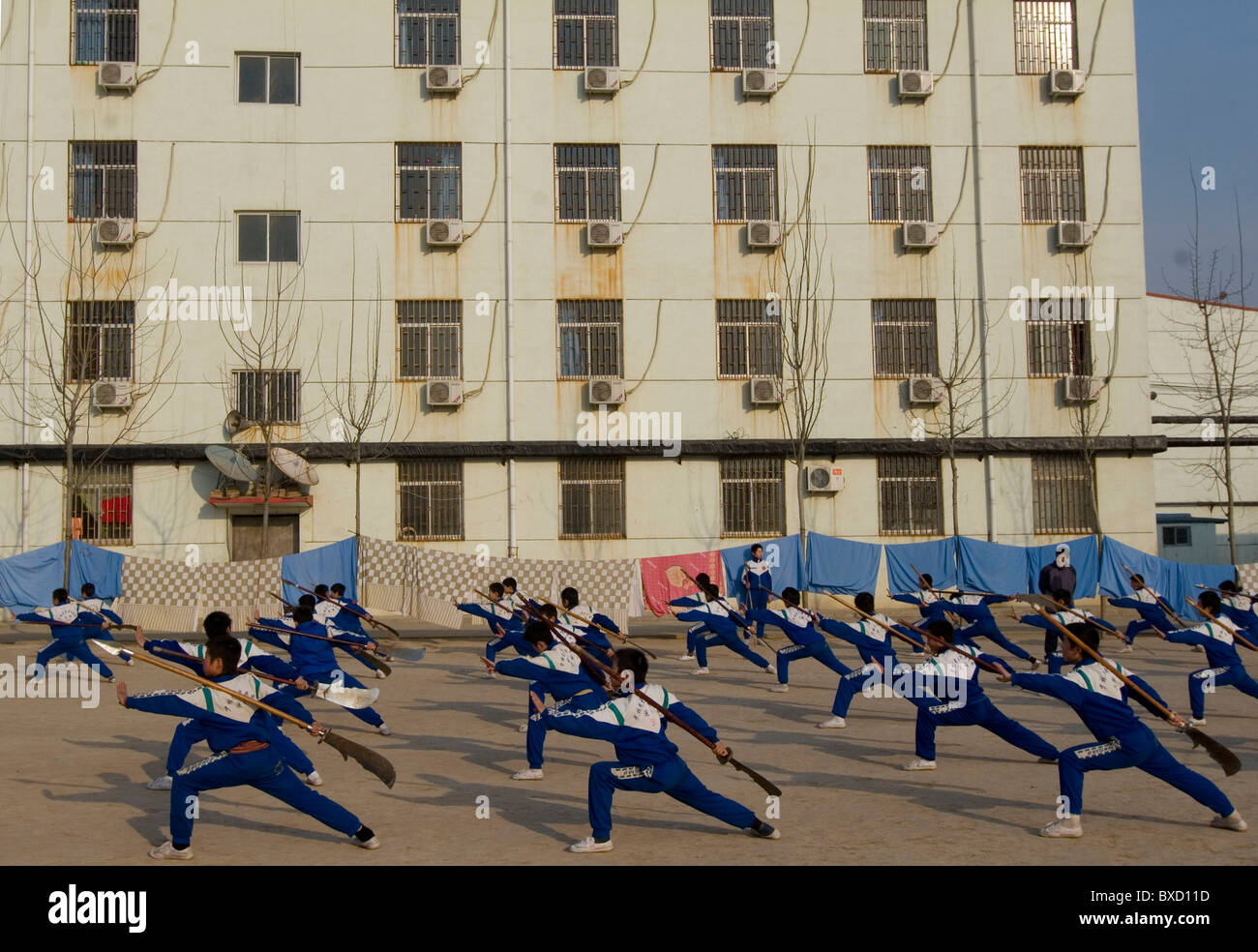 Young students training at local Shaolin Kung Fu school, Shaanxi ...