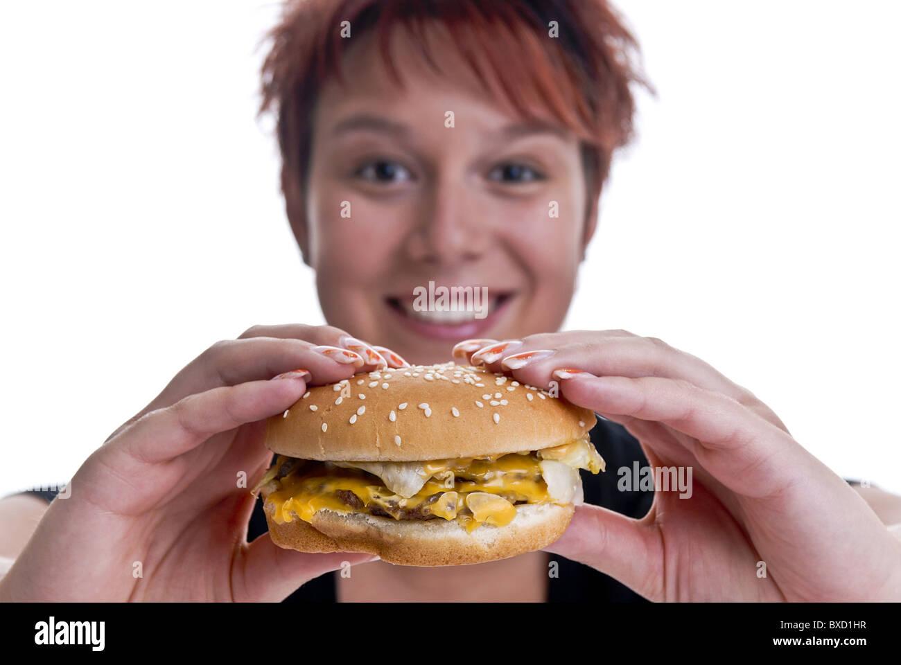 Woman with hamburger Stock Photo - Alamy